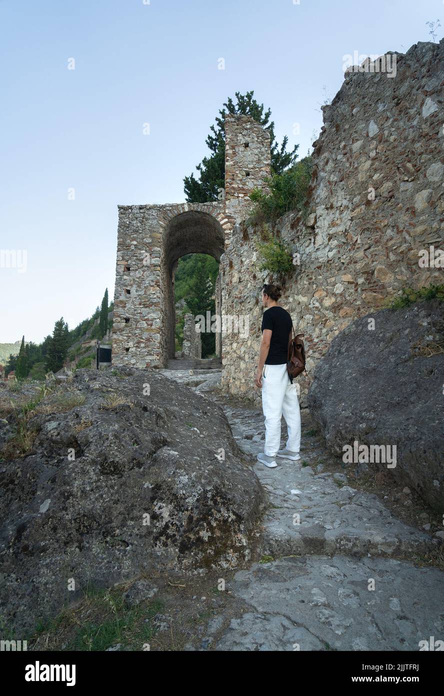 Man exploring Mystras town Stock Photo - Alamy