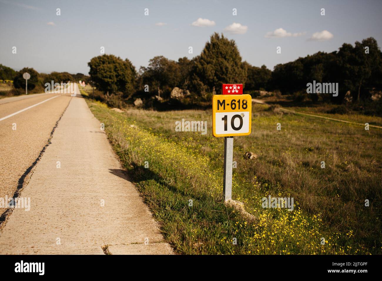 Road sign flowers hi-res stock photography and images - Alamy