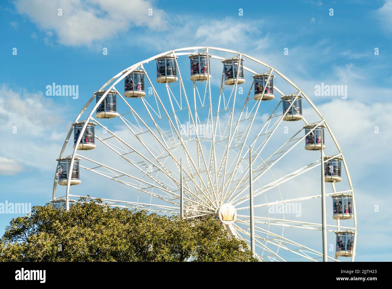 A ferris wheel against a cloudy sky in Sydney, Australia Stock Photo ...