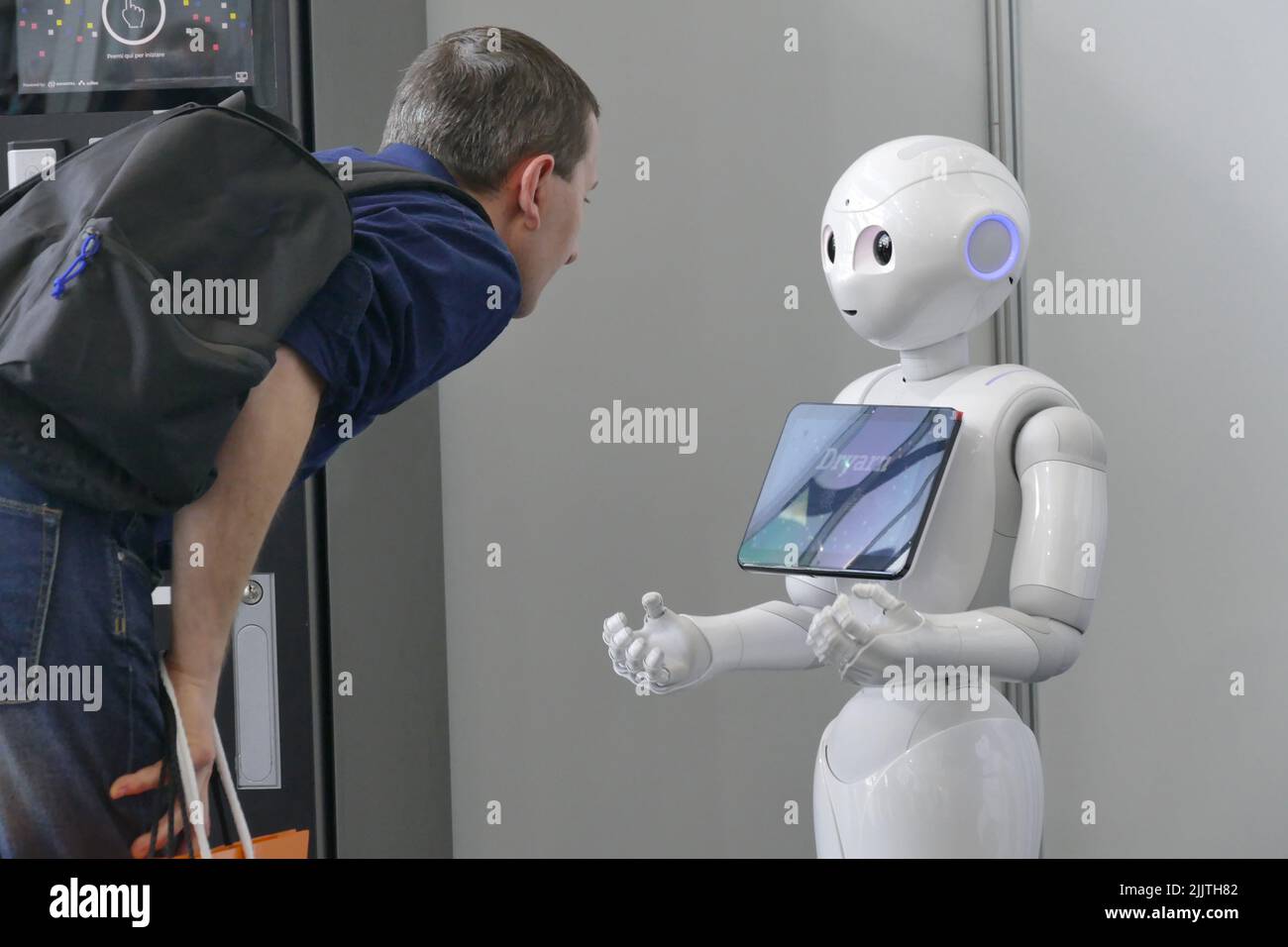 A social humanoid robot optimized for human interaction through conversation and his touch ...