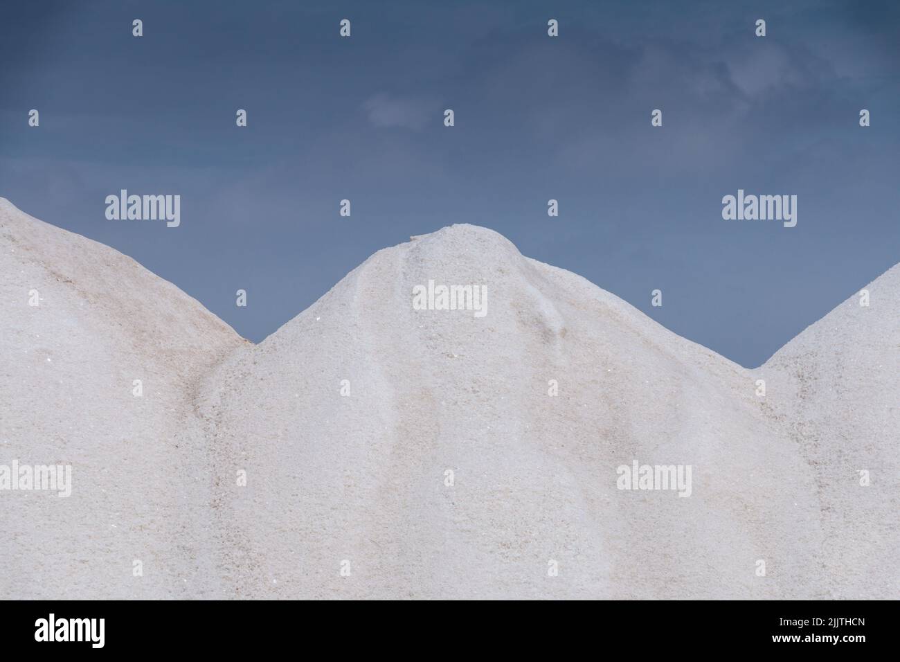 hills of naturally produced sea salt in a seawater saline Stock Photo ...