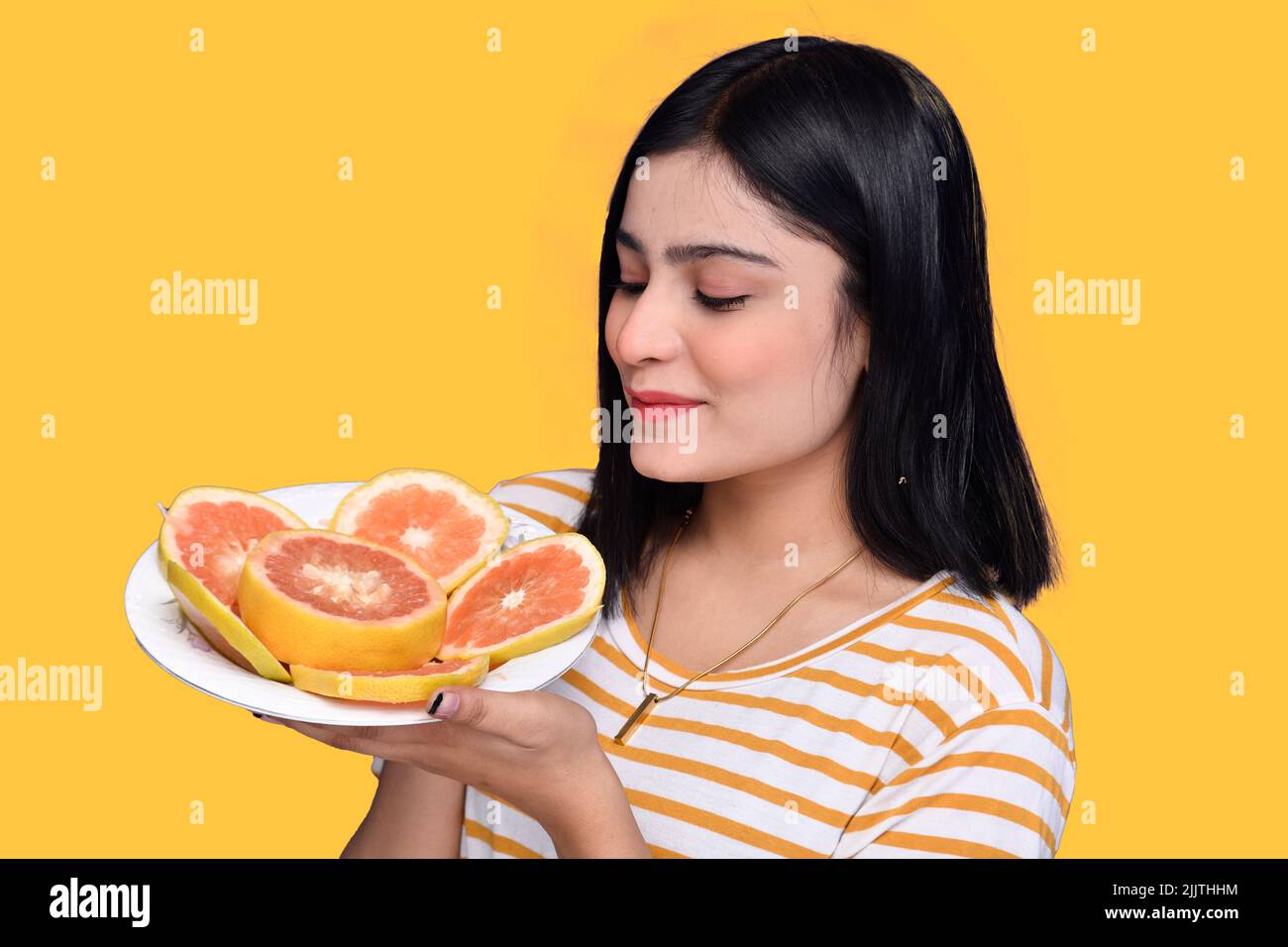Women eating junk food hi-res stock photography and images - Alamy