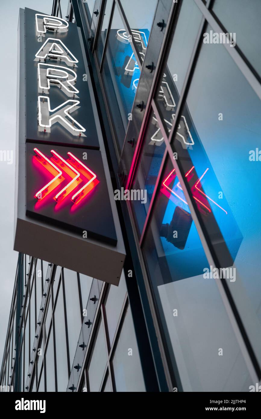 Green neon car park sign hi-res stock photography and images - Alamy