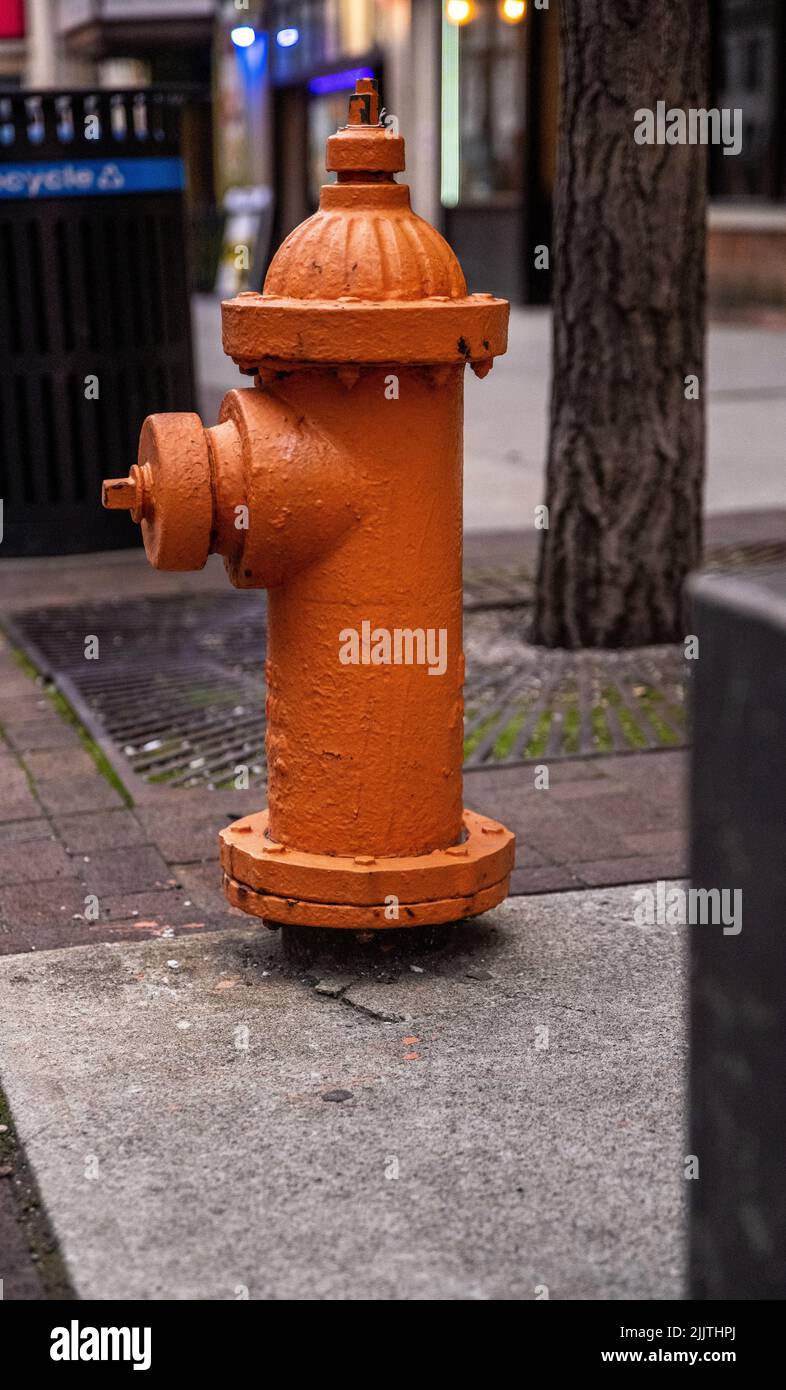 A beautiful shot of an orange fire hydrant Stock Photo - Alamy