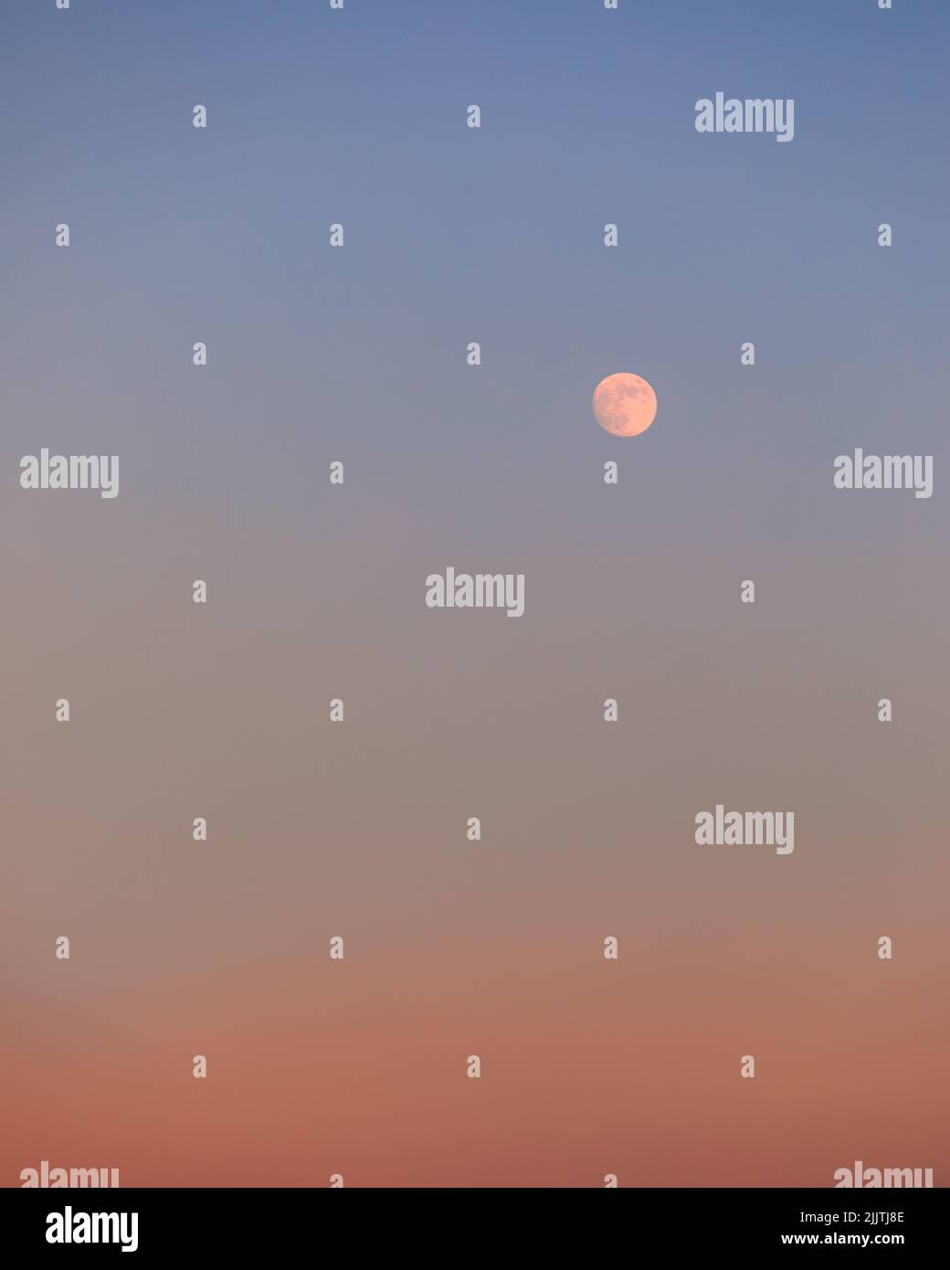 Gradient sky with a full moon at sunset time Stock Photo - Alamy