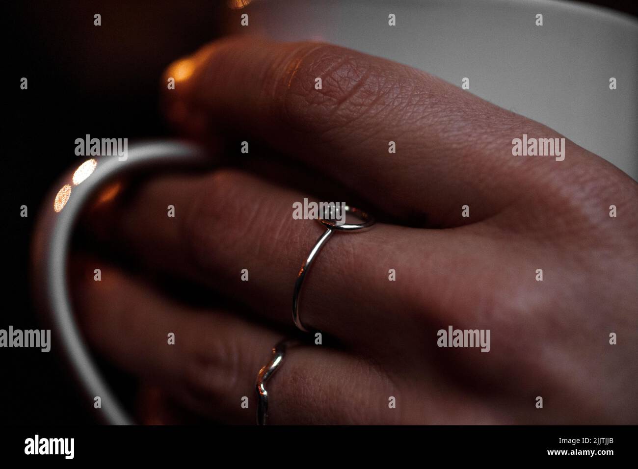 Hand with rings hi-res stock photography and images - Alamy