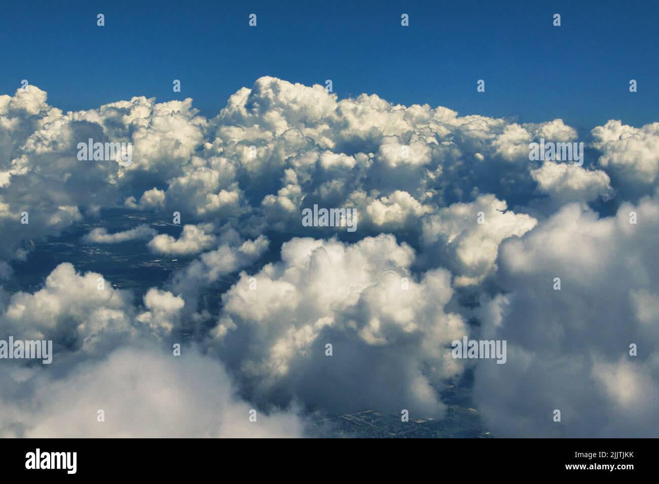 The big white clouds in the sky Stock Photo - Alamy