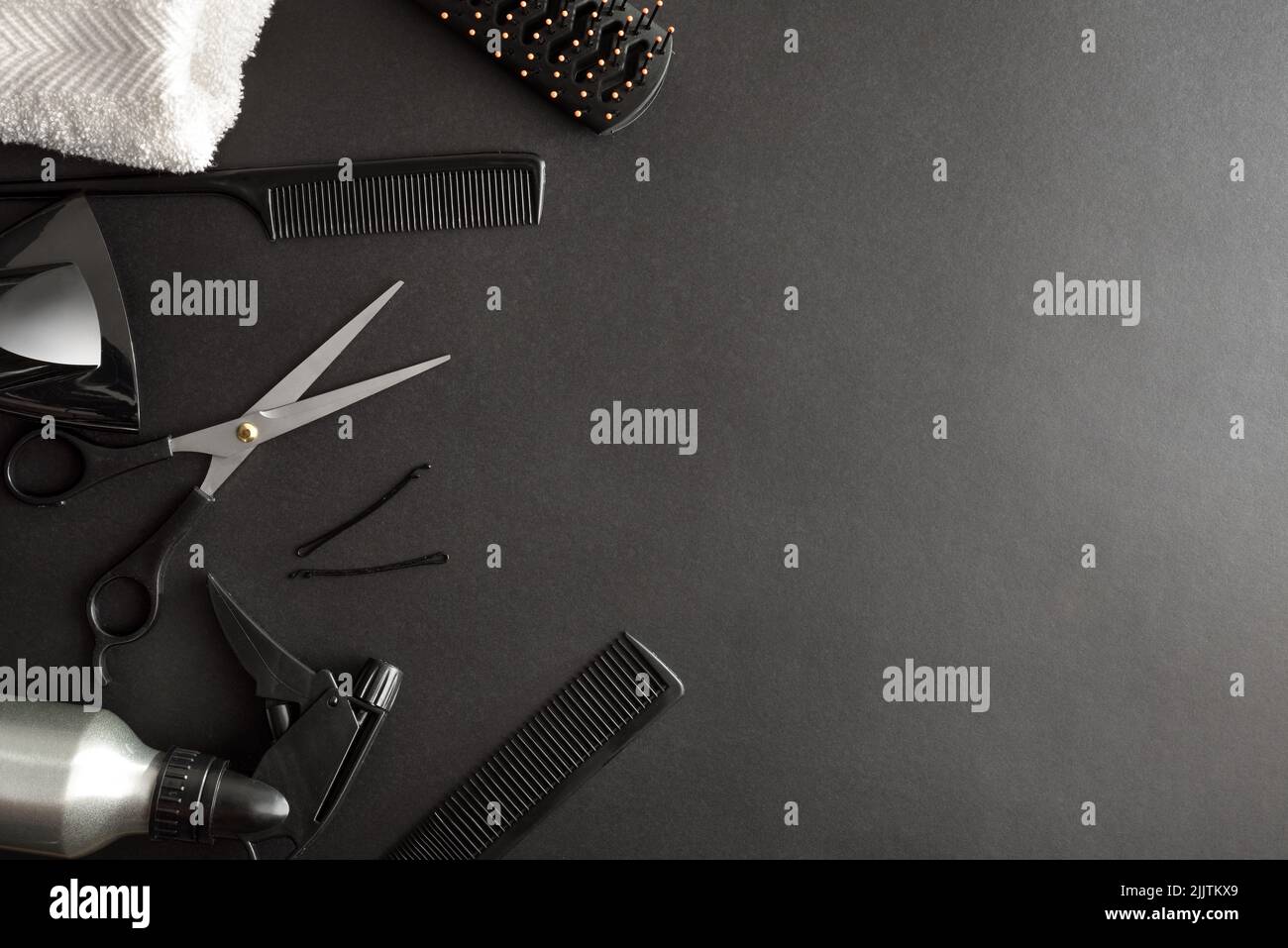 Basic conceptual hairdressing background with two scissors and comb on ...