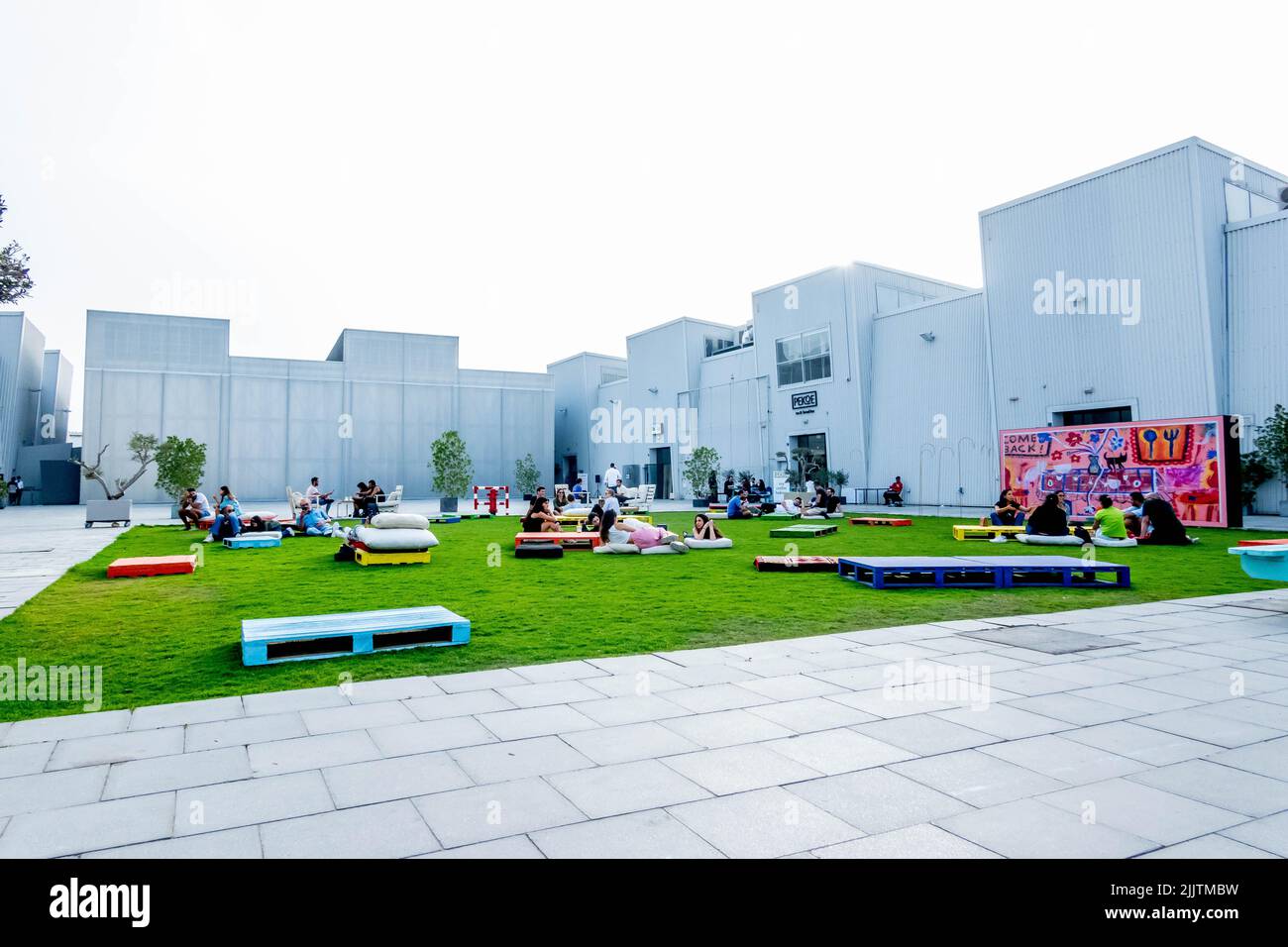 A view of locals and tourists chilling in Alserkal Avenue in Dubai, UAE ...