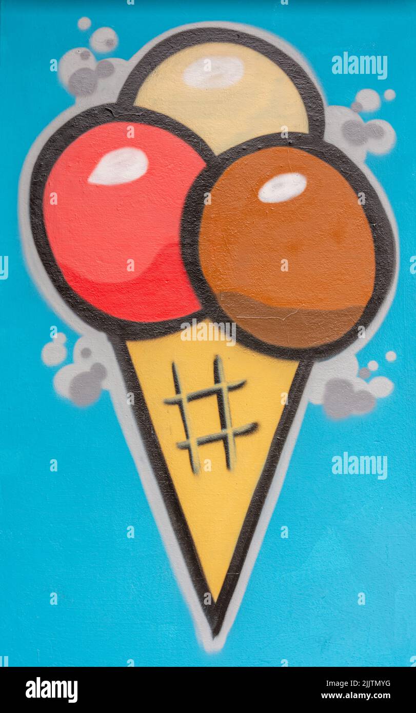 An ice cream cone graffiti art on blue wall in Auerbach, Saxony Stock ...