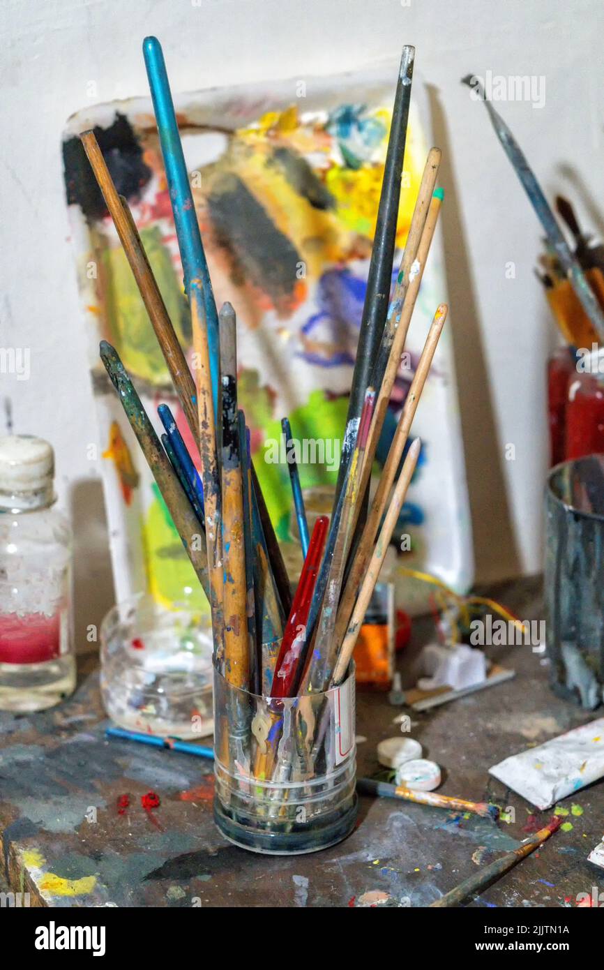 Workplace artists - brushes and paints to create masterpieces Stock ...