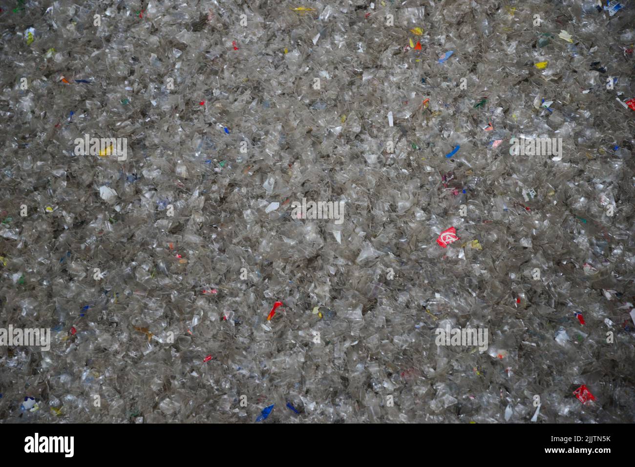Recycled plastic chips dries in a recycling factory in Dhaka ...