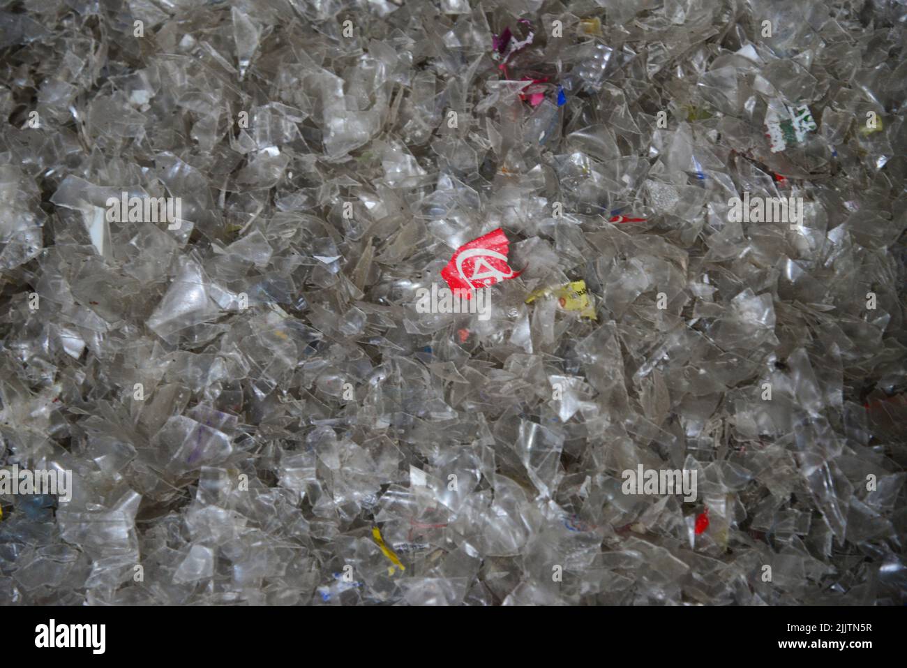 Recycled plastic chips dries in a recycling factory in Dhaka ...