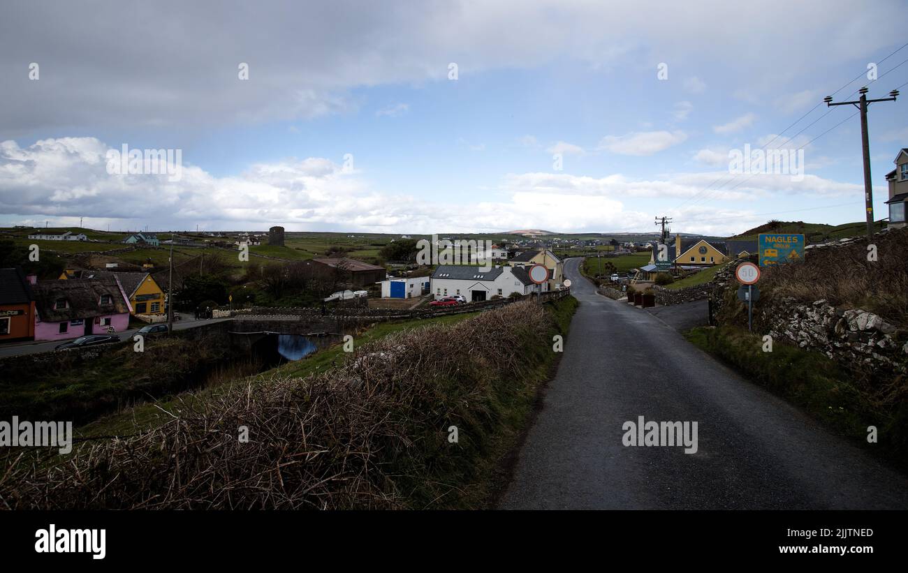 A beautiful landscape of a road in a village in the morning Stock Photo ...