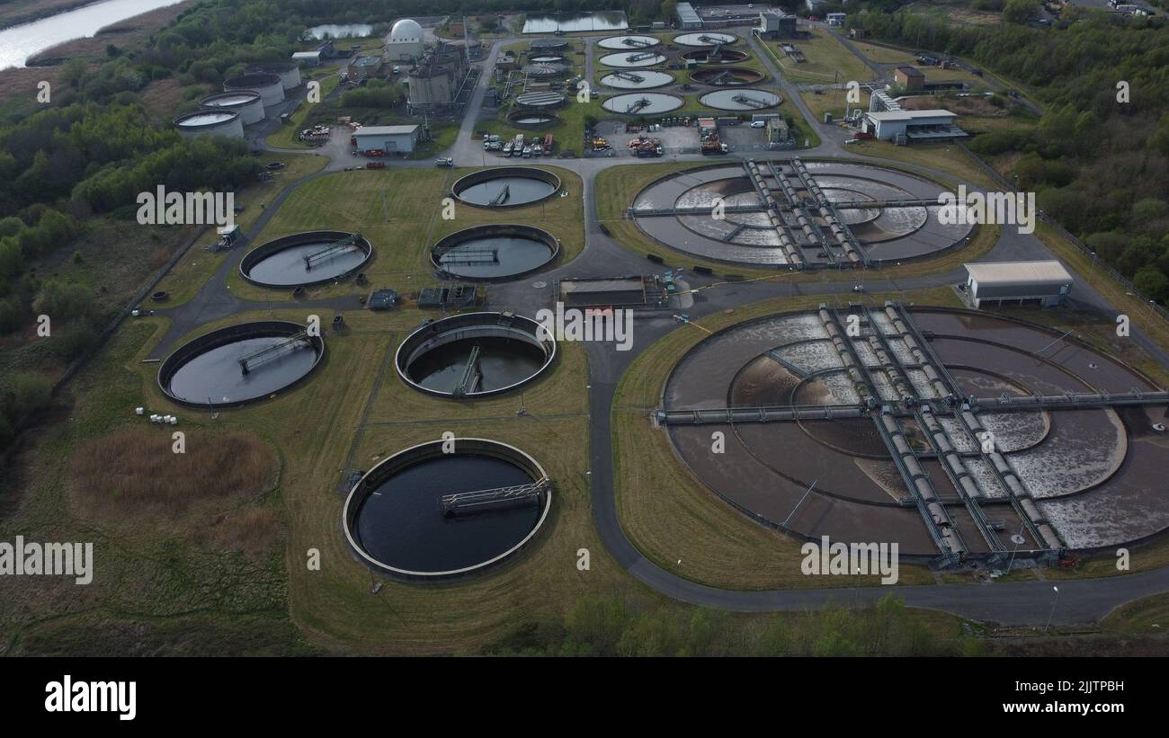 An aerial shot by a drone of the wastewater treatment plant with the ...