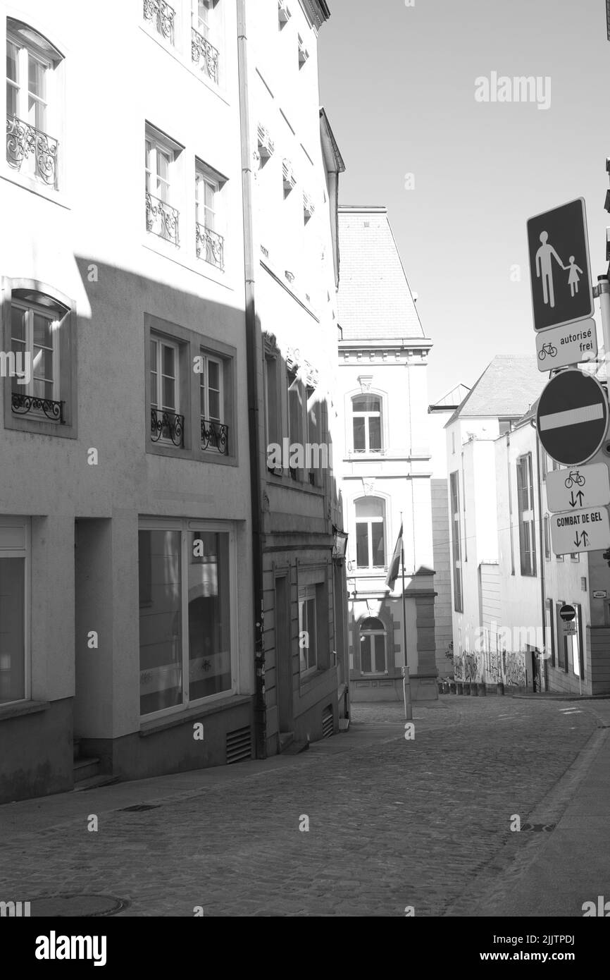 A vertical shot of modern buildings in black and white Stock Photo - Alamy