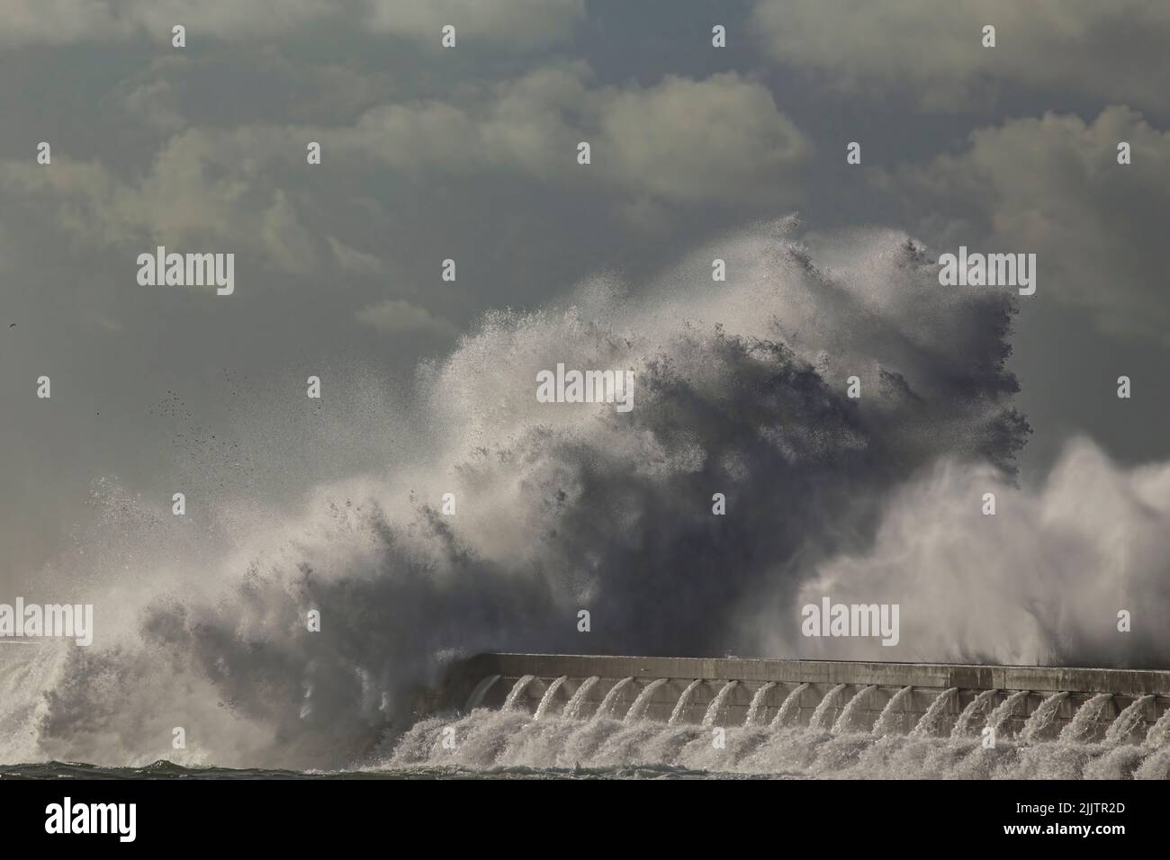 Soft backlit huge wave splash, north of Portugal Stock Photo - Alamy