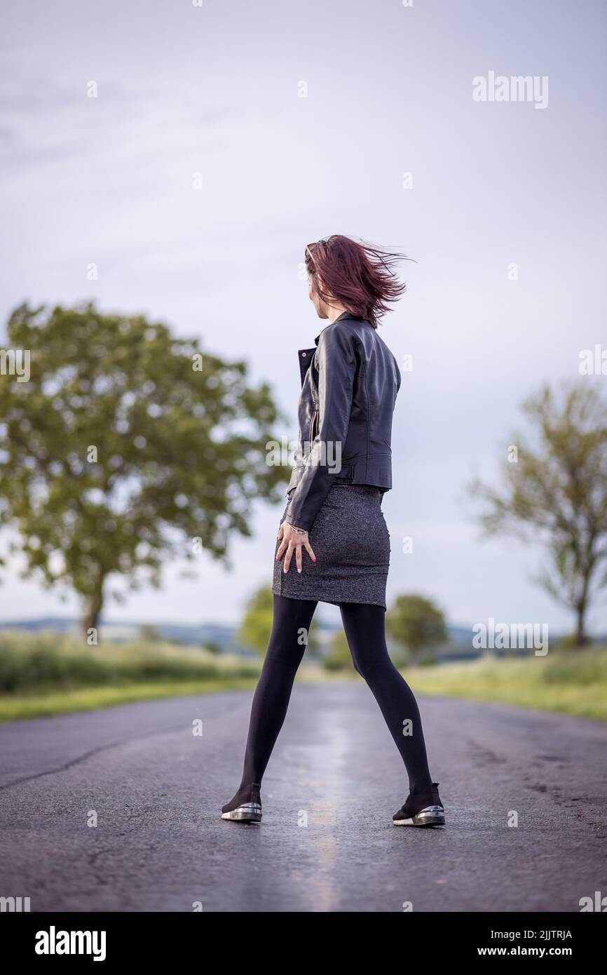 Beautiful woman walking road hi-res stock photography and images - Alamy