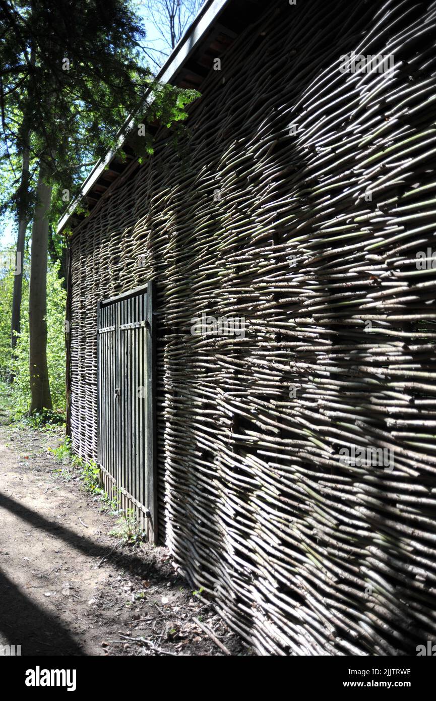 A vertical shot of the front side of a rural barn with trees Stock ...