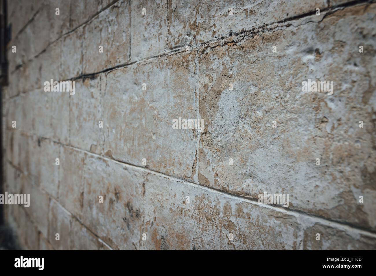 A closeup of an old rough textured wall outdoors - perfect for ...