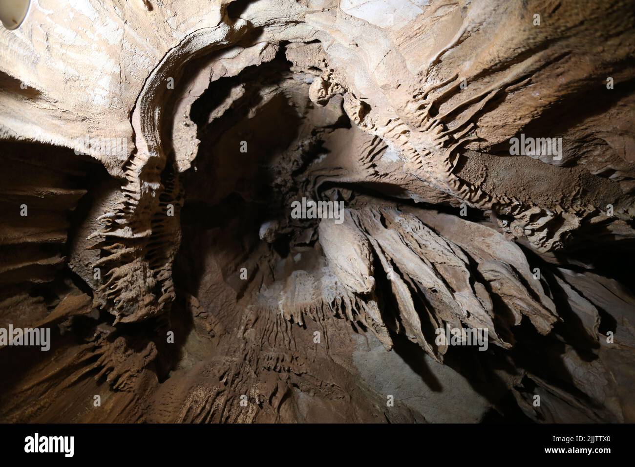 A view inside a cave with abstract formations Stock Photo - Alamy