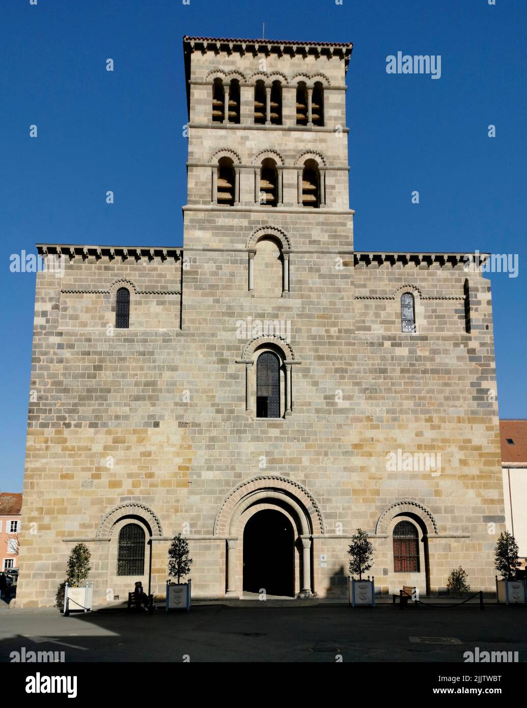The back entrance of the abbey church of Saint-Austremoine in Issoire ...