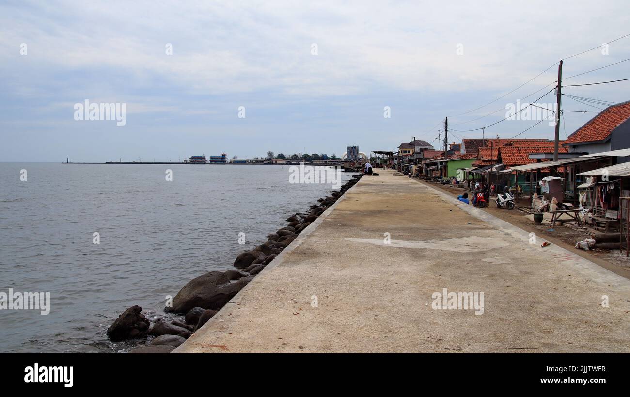 The seawater retaining buildings against the embankment retaining tidal ...