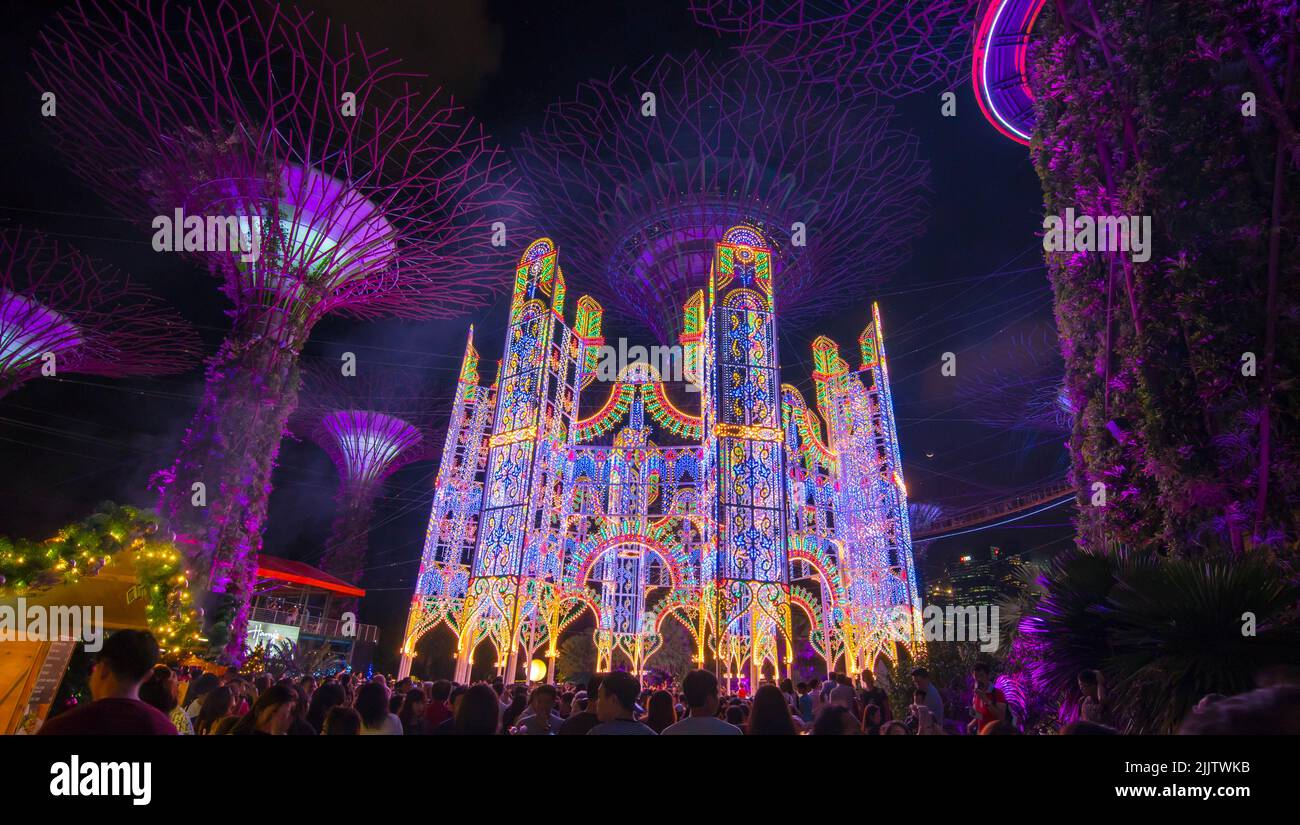 The illuminated Gardens by the Bay, Singapore at night Stock Photo - Alamy