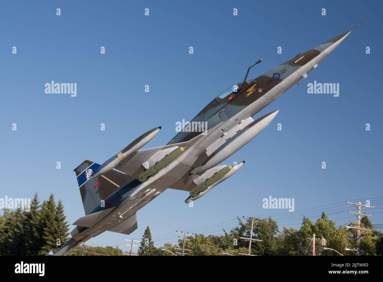 CF5 military aircraft - fighter jet on a pedestal in the Air Force ...