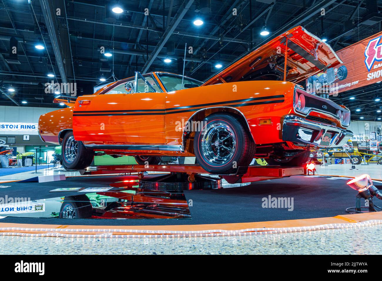 An orange car on display at the World Of Wheels Exhibit in Winnipeg ...