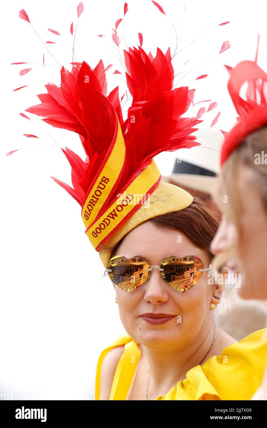 A female racegoers with a Glorious Goodwood headpiece on day three of ...