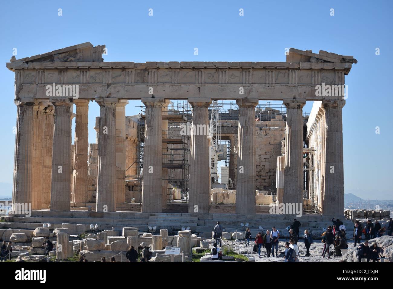 A beautiful view of the historic Acropolis pantheon and the blue sky over it in Athens, Greece ...