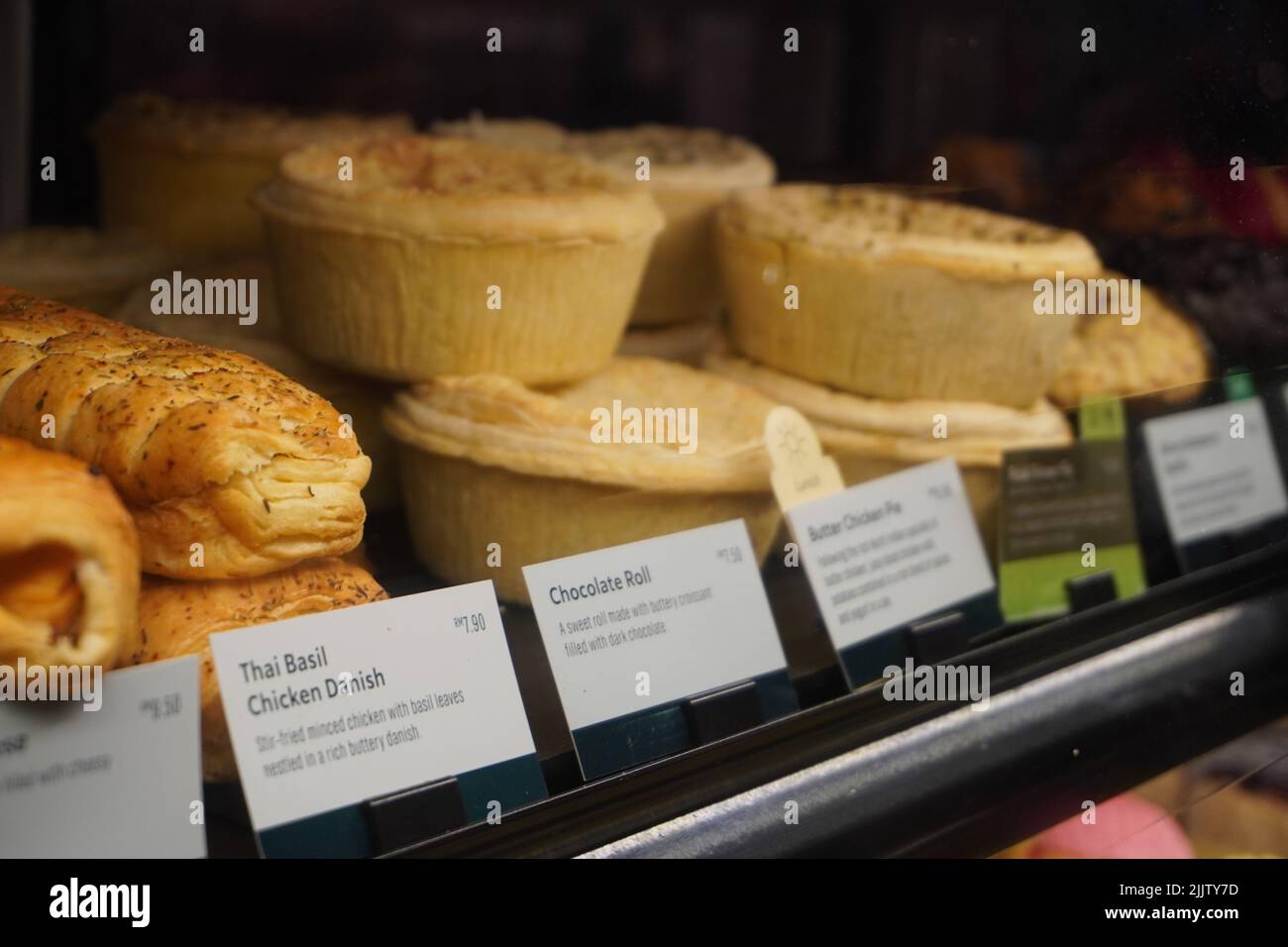 A closeup of freshly baked pastries displayed on a counter Stock Photo ...