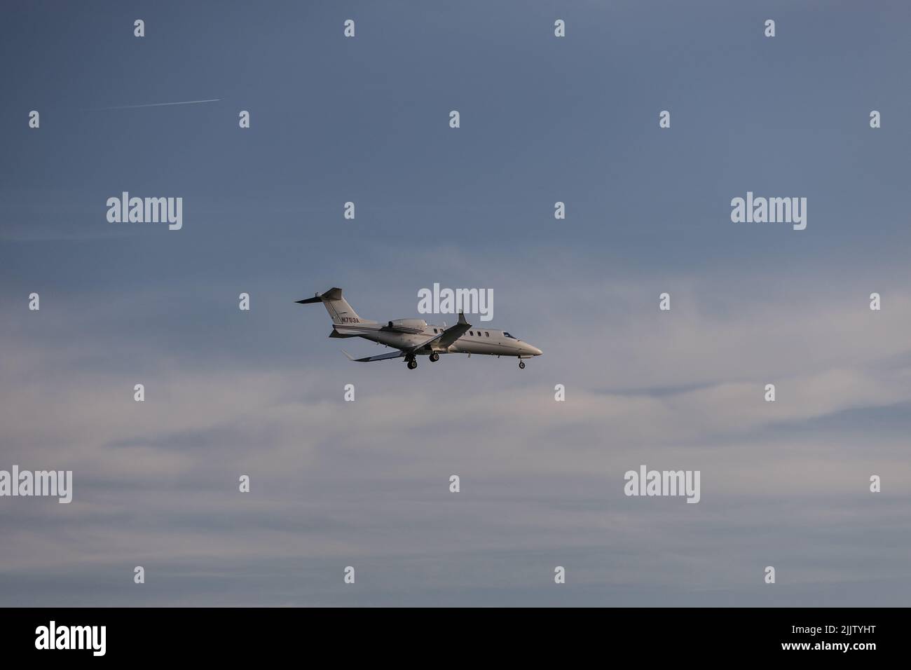 A private jet plane getting ready to land in Boston Stock Photo - Alamy