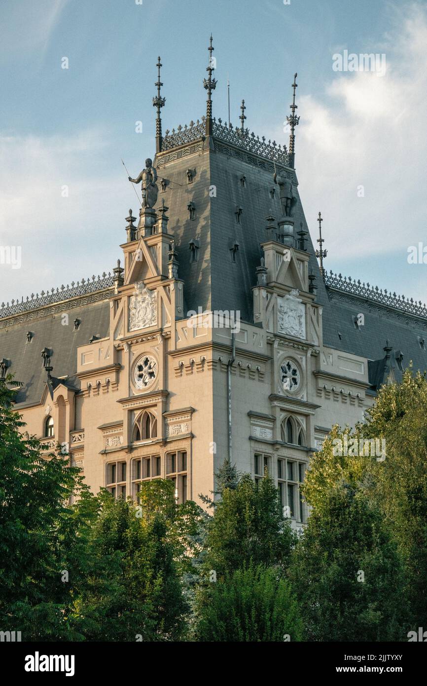 Palace of Culture of Iasi portait photo with blue sky, white clouds and ...