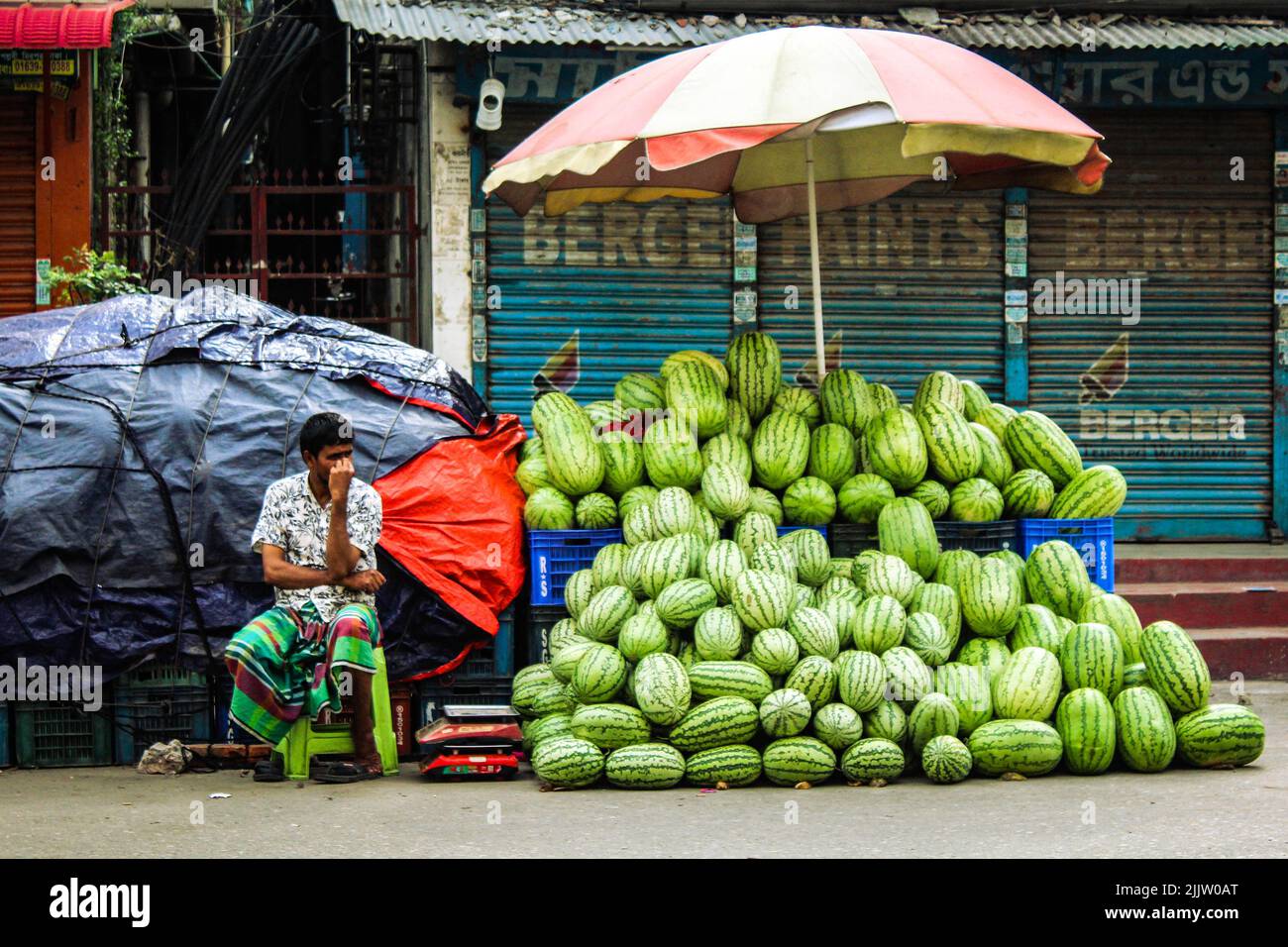 A closeup of Watermelons Seller on the Streets of Dhaka, Bangladesh ...