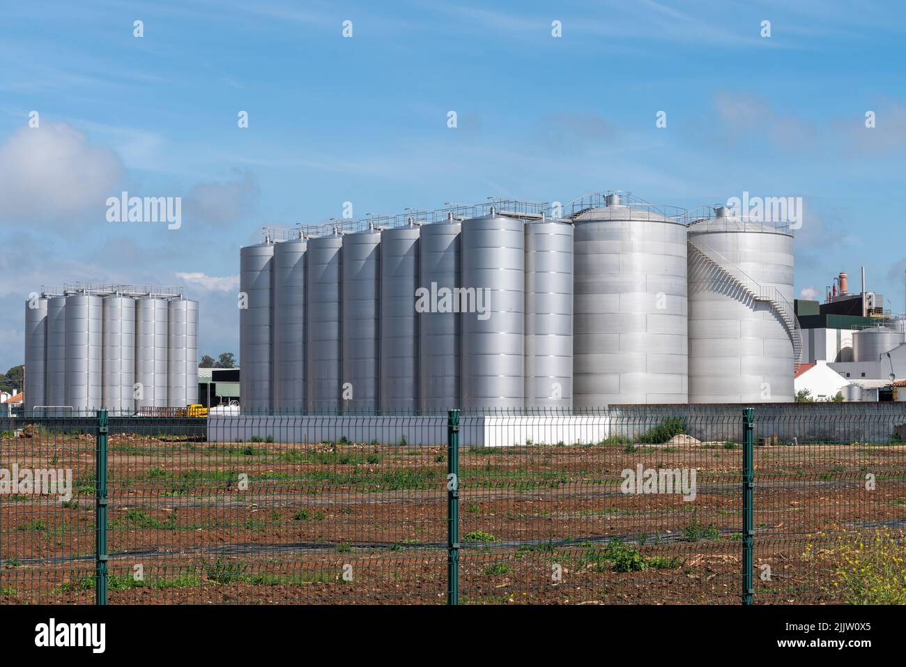 The metal silos of a factory Stock Photo - Alamy