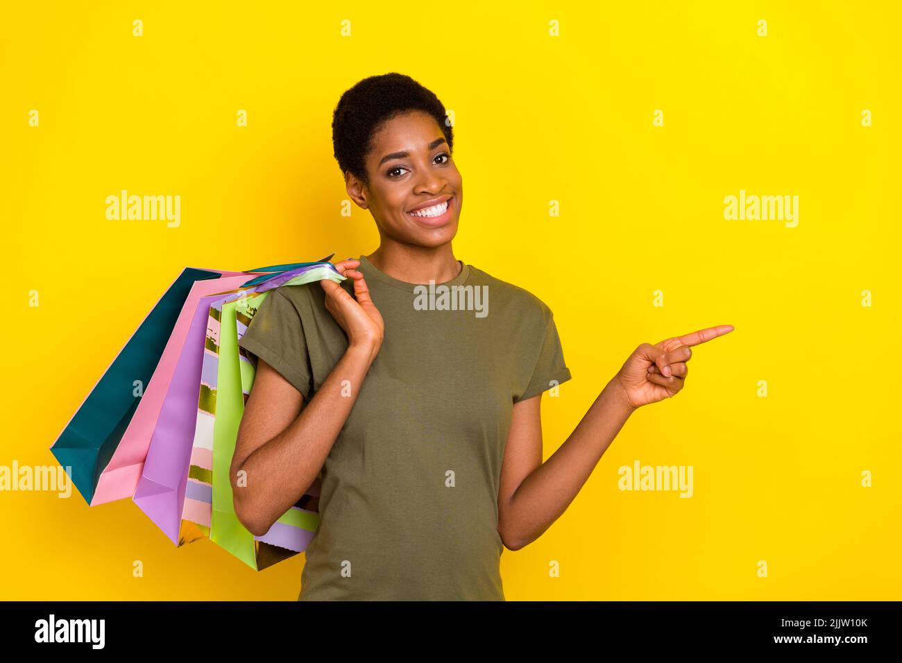 Portrait of cheerful nice person direct finger empty space proposition ...