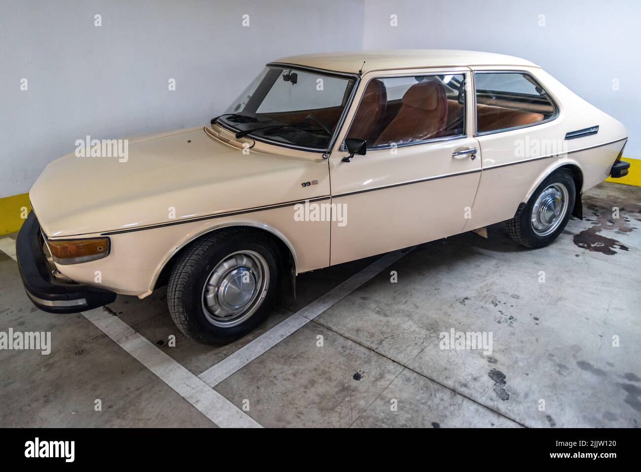 An angle shot of a Saab 99 L model beige car Stock Photo - Alamy