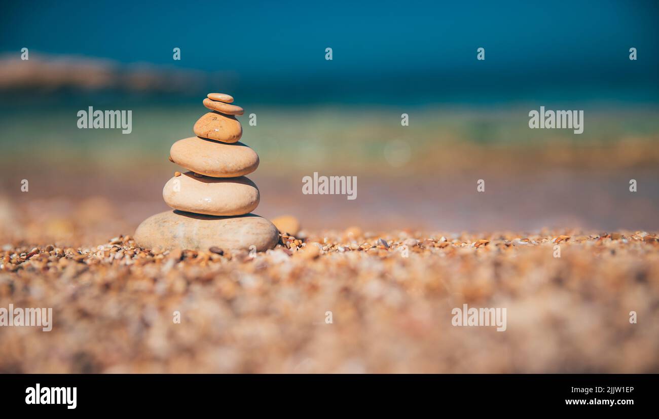 Spa Pebbles on the Beach Stock Photo - Alamy