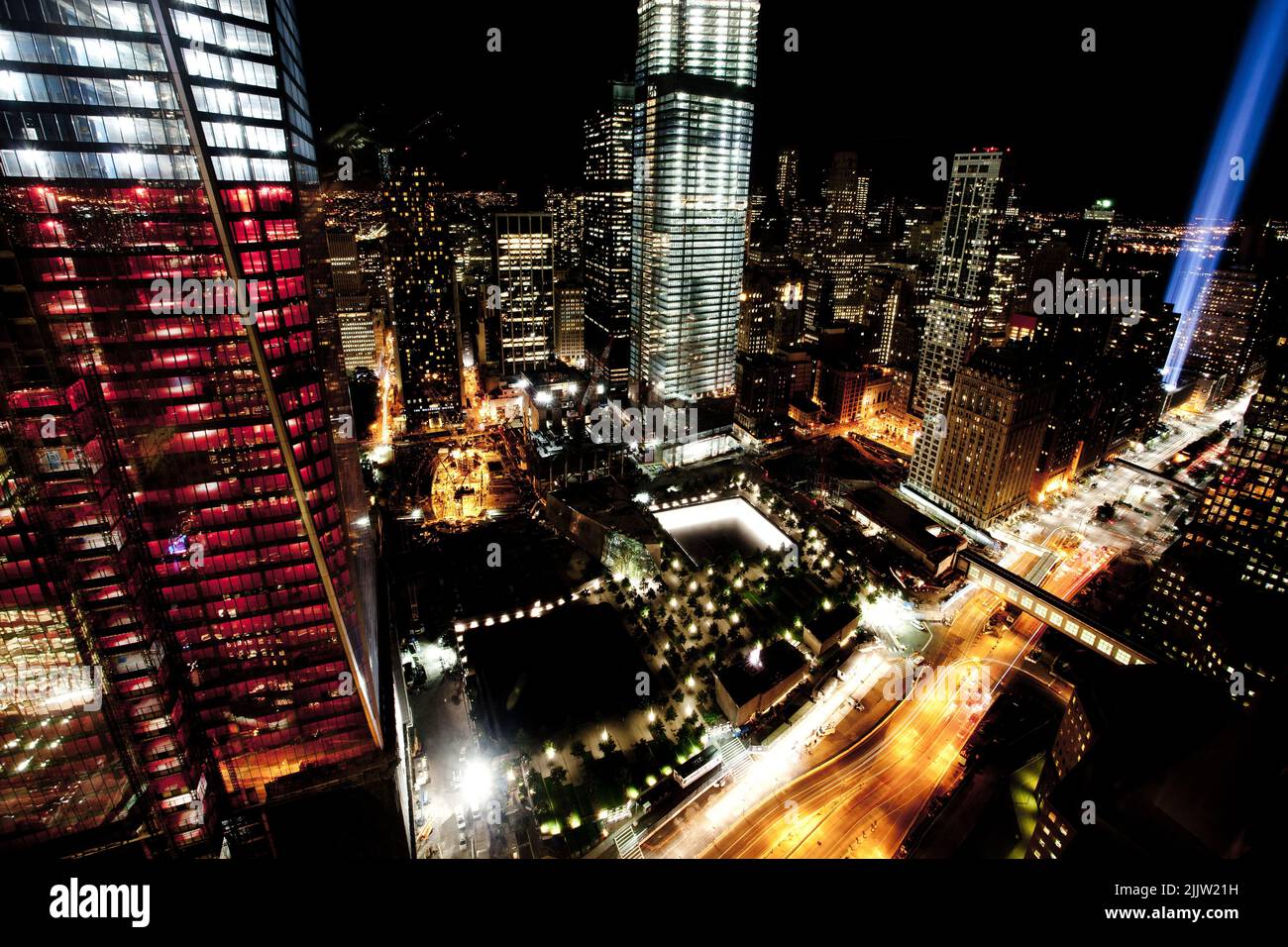 An aerial shot of a night city with illustrated buildings and streets ...