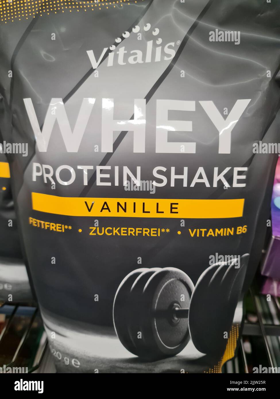 A large black pack of Vitalis Whey brand protein shake - vanilla flavor ...