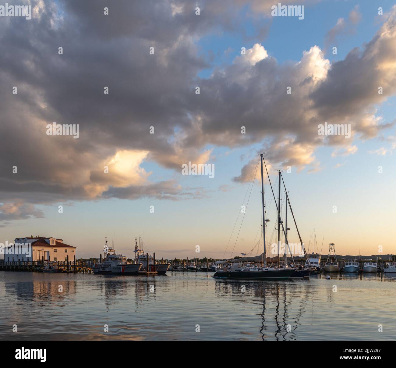 The sailboats in harbor at scenic sunset in Martha's Vineyard ...