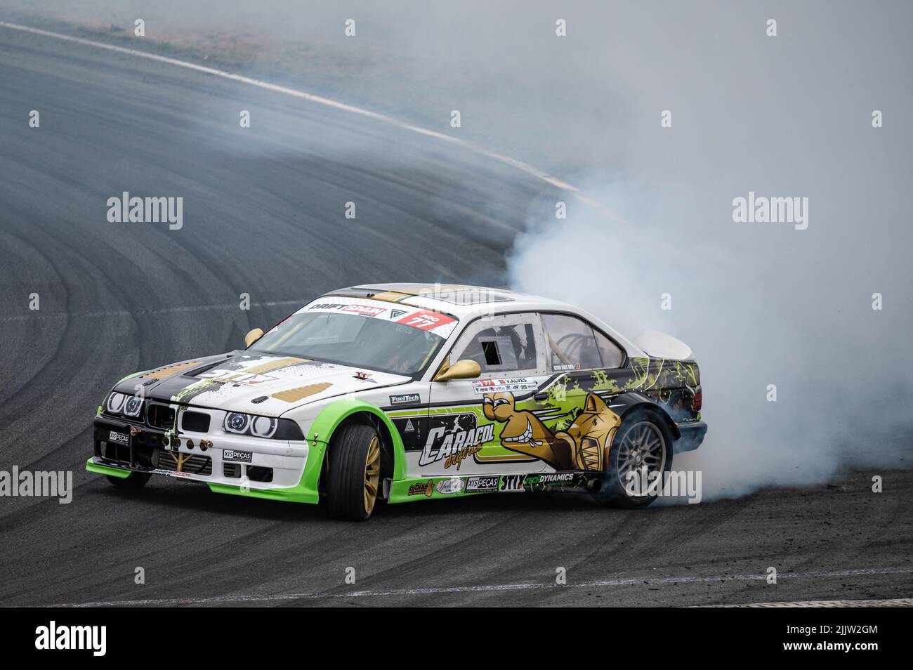 Drifting Bmw E36 drift at the Navarra circuit Stock Photo - Alamy