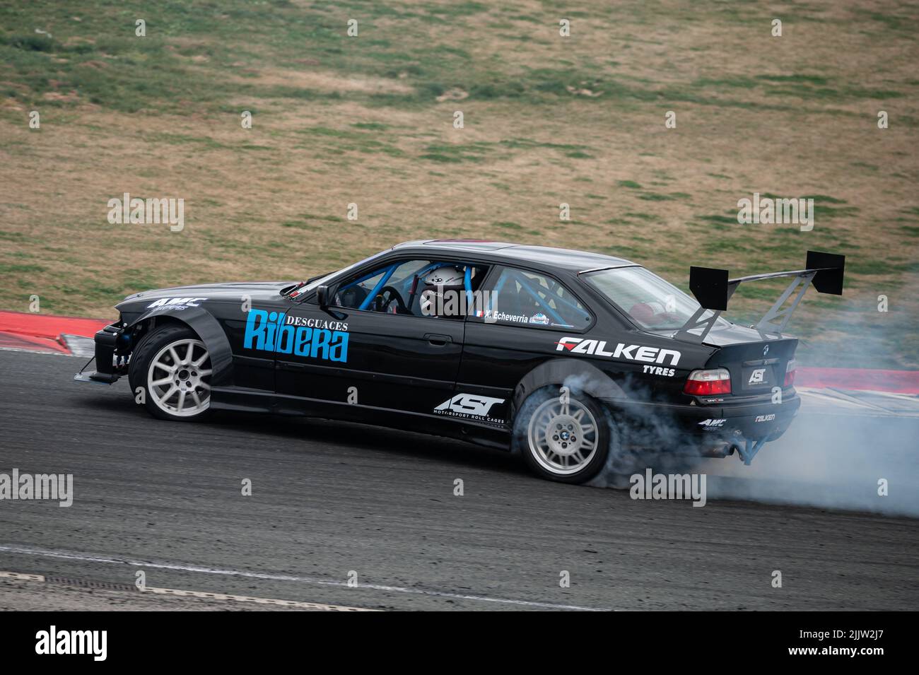 Black Bmw E36 drift at the Navarra circuit Stock Photo - Alamy
