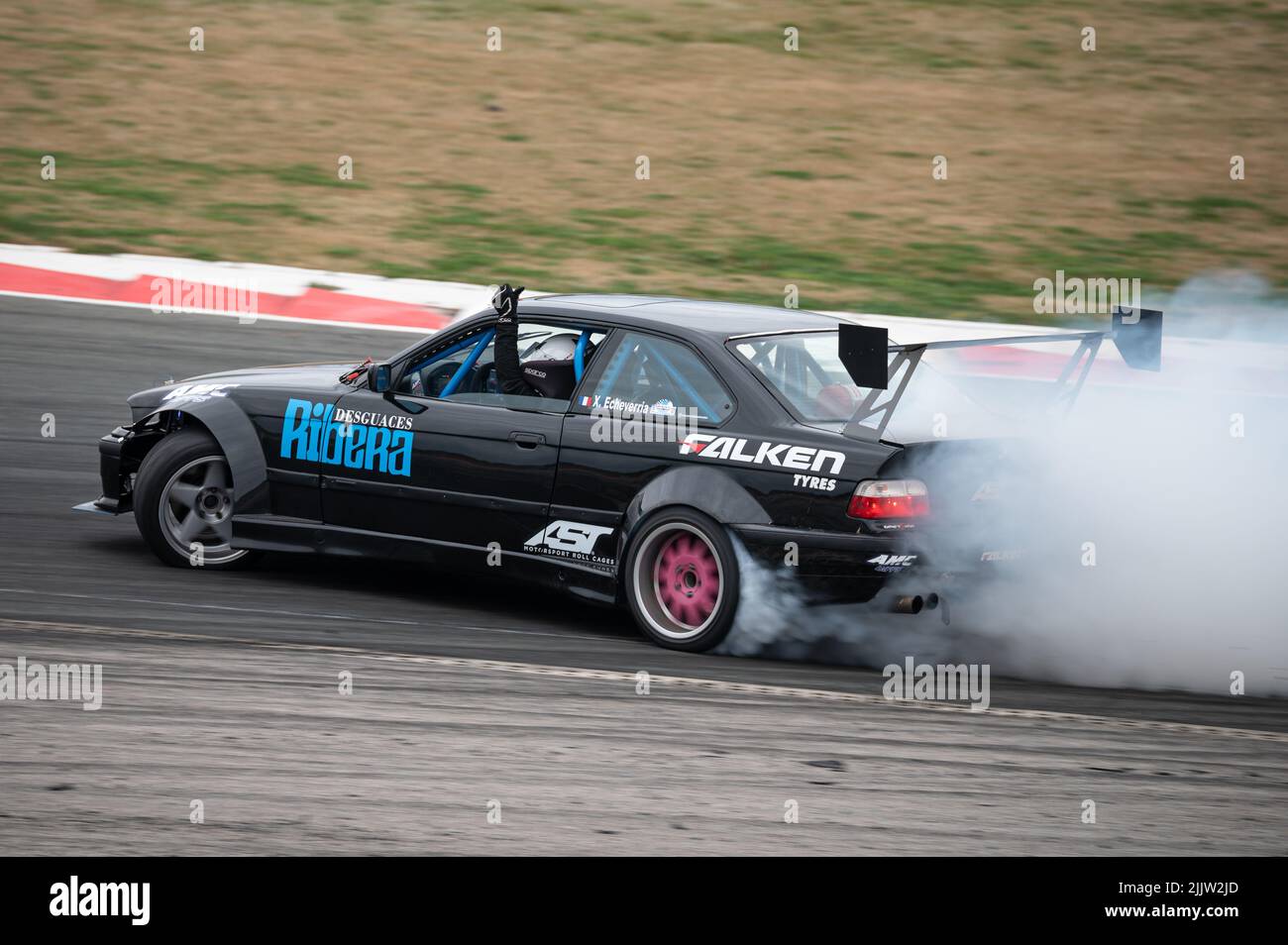 Black Bmw E36 drift at the Navarra circuit Stock Photo - Alamy