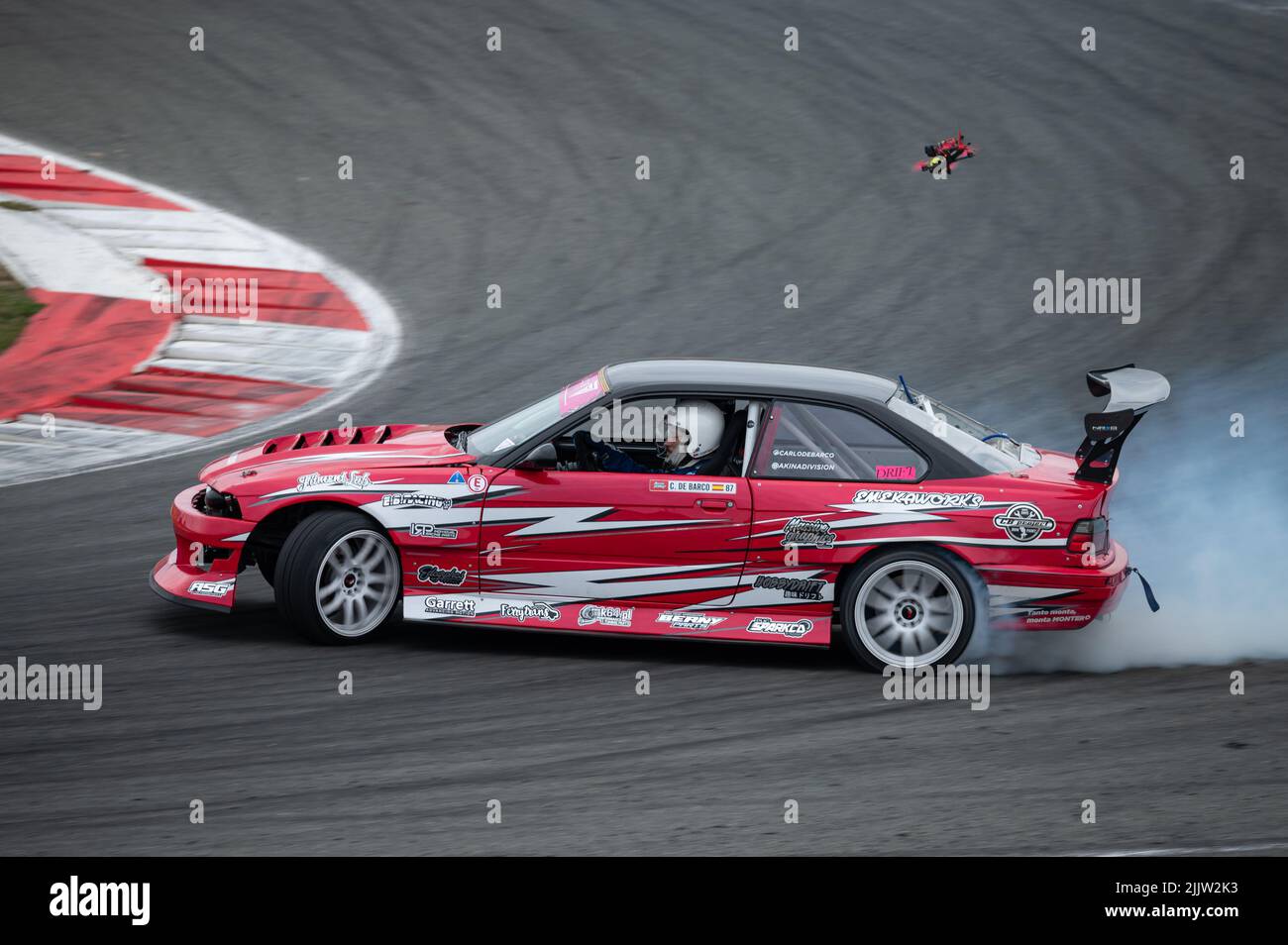 Red Bmw E36 drift at the Navarra circuit Stock Photo - Alamy