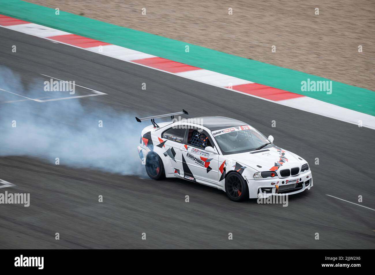 E46 drifting on the racing circuit Stock Photo - Alamy