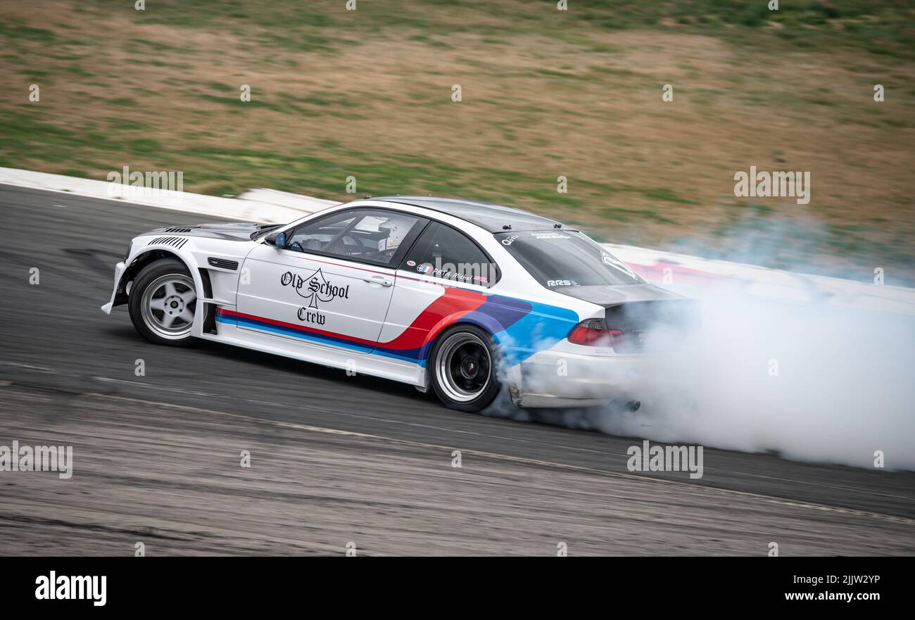E46 drifting on the racing circuit Stock Photo - Alamy