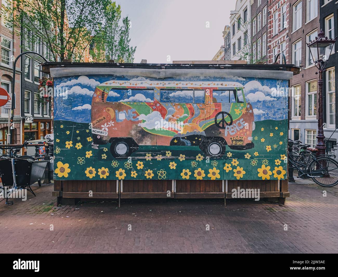 A colorful canvas with vibrant artwork on the street in early morning ...